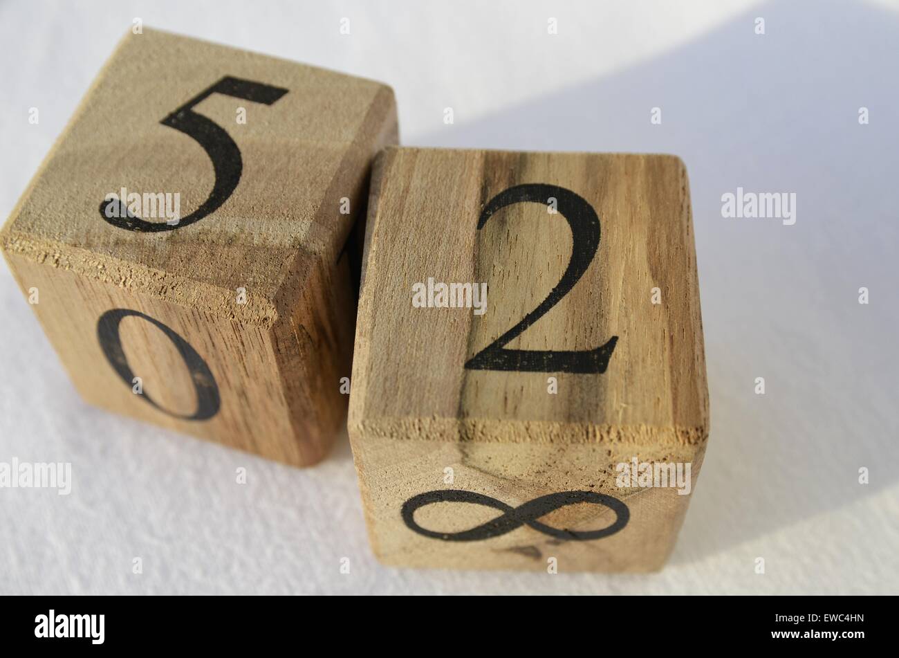 Numbers on wooden cubes Stock Photo - Alamy