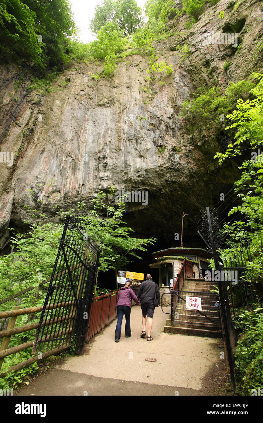 People approach the vast entrance of Peak Cavern, a show cave in ...