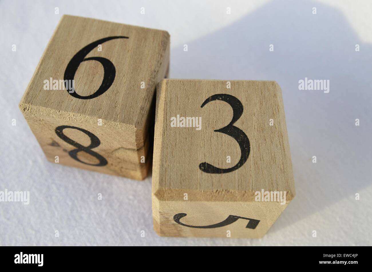 Numbers on wooden cubes Stock Photo - Alamy