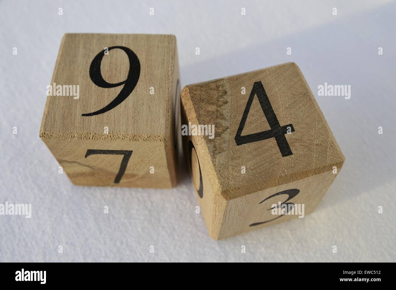 Numbers on wooden cubes Stock Photo - Alamy