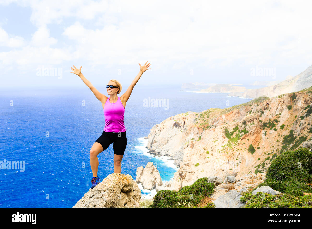Success achievement climbing or hiking accomplishment concept, woman ...