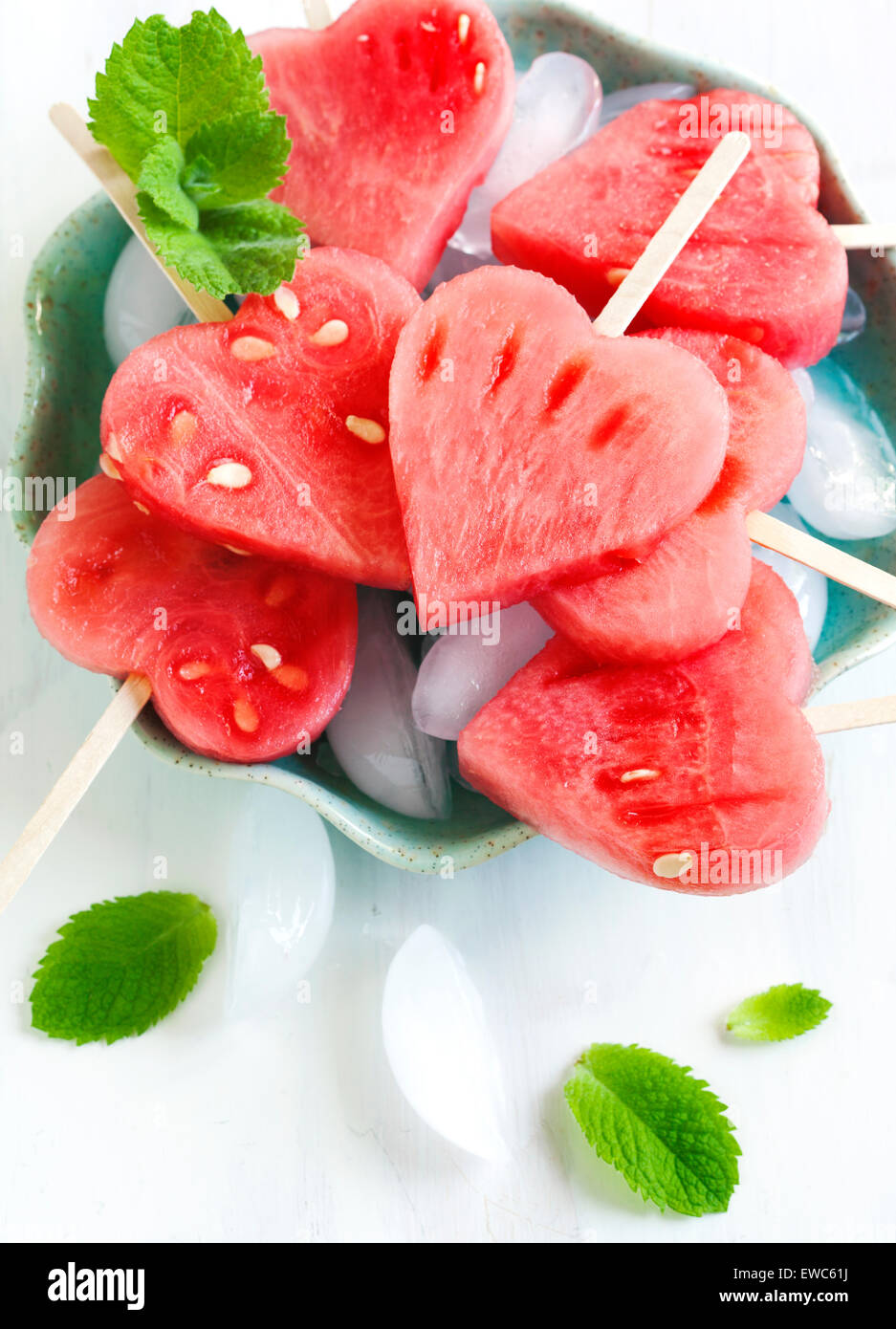 Watermelon Pops. Watermelon slices cut into heart shape pieces Stock ...