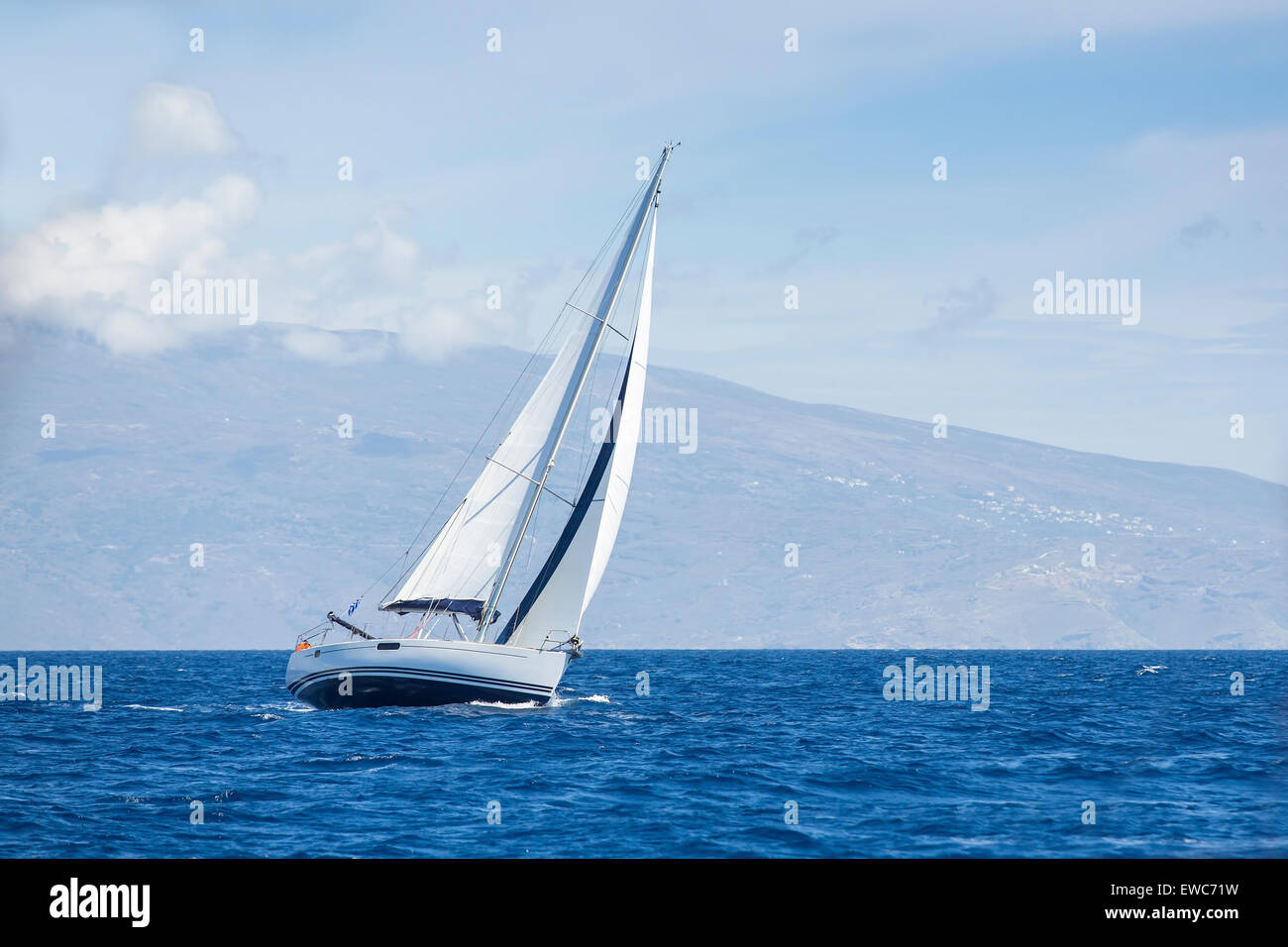 Wind in yacht sails with beautiful sky. Luxury yachts Stock Photo - Alamy