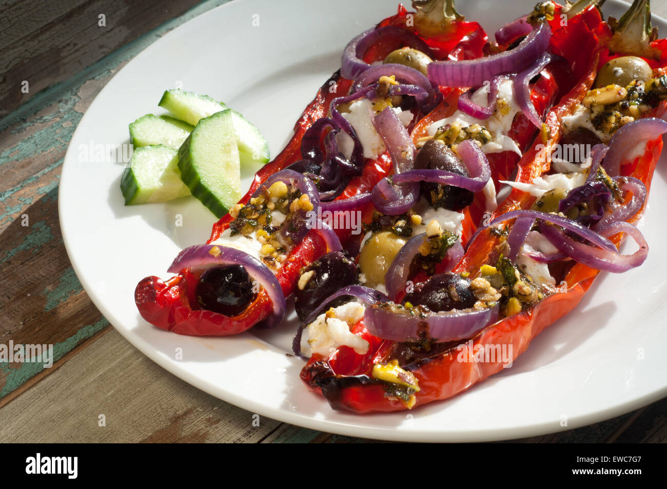 Roasted, stuffed romano peppers Stock Photo - Alamy