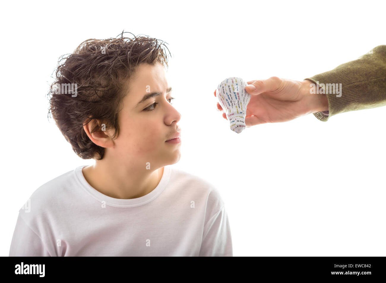 Caucasian smooth-skinned boy takes a puzzled look to 3D print prototype ...