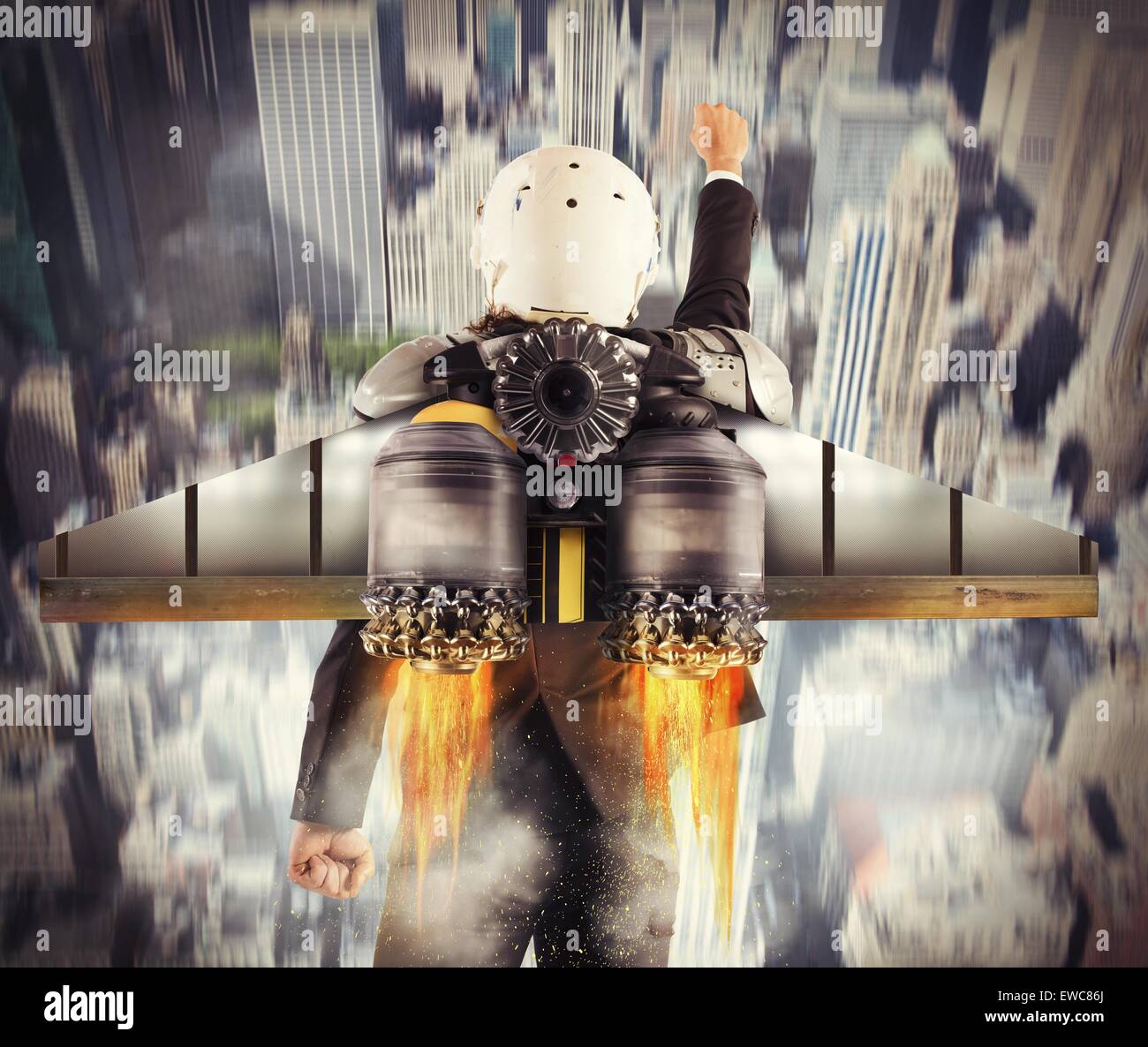 Determined man flies high Stock Photo - Alamy