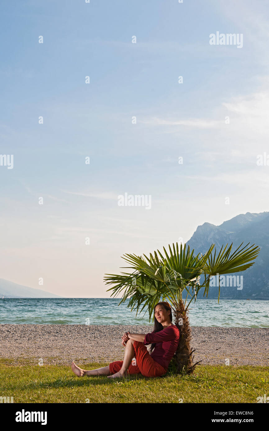 Sitting Under Palm Tree