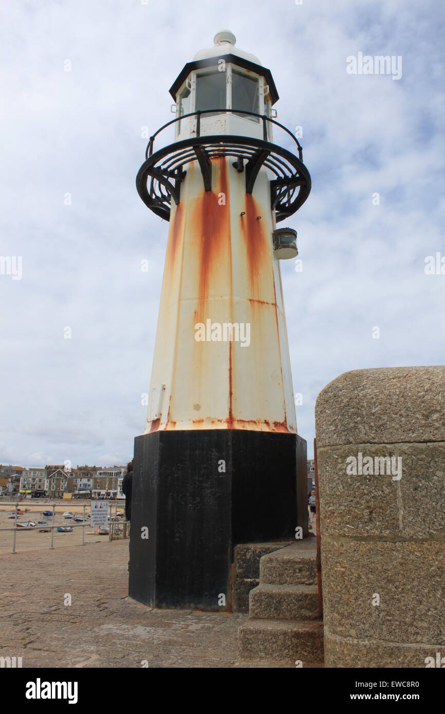rust stained St Ives lighthouse on sunny day in summer Stock Photo - Alamy