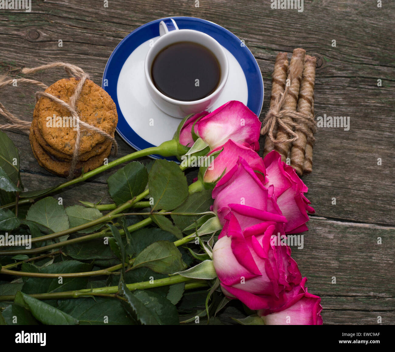 union of roses and cookies the top view Stock Photo - Alamy