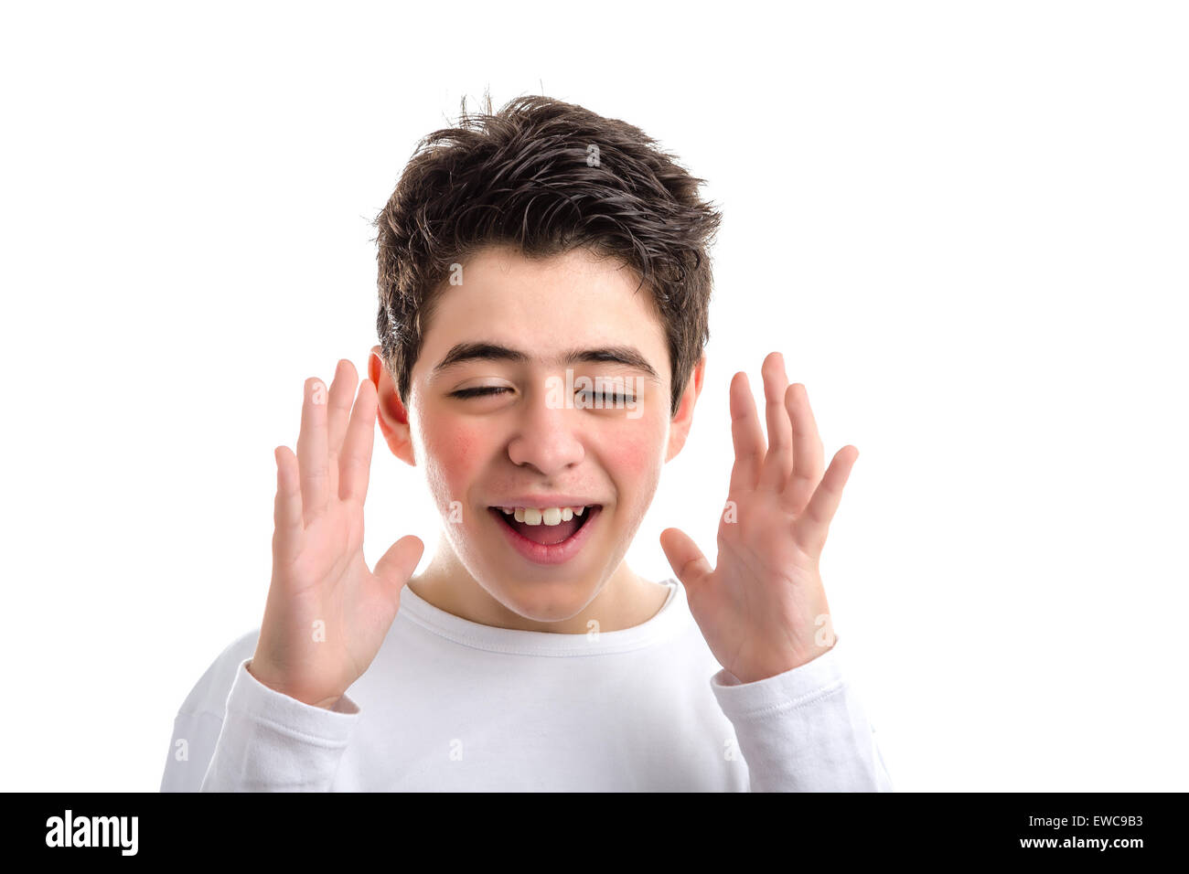 Happy Caucasian smooth-skinned boy in a white long sleeved t-shirt ...