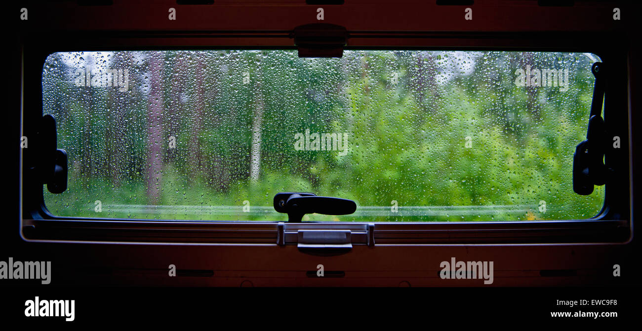 looking out of a rainy camper van window Stock Photo - Alamy