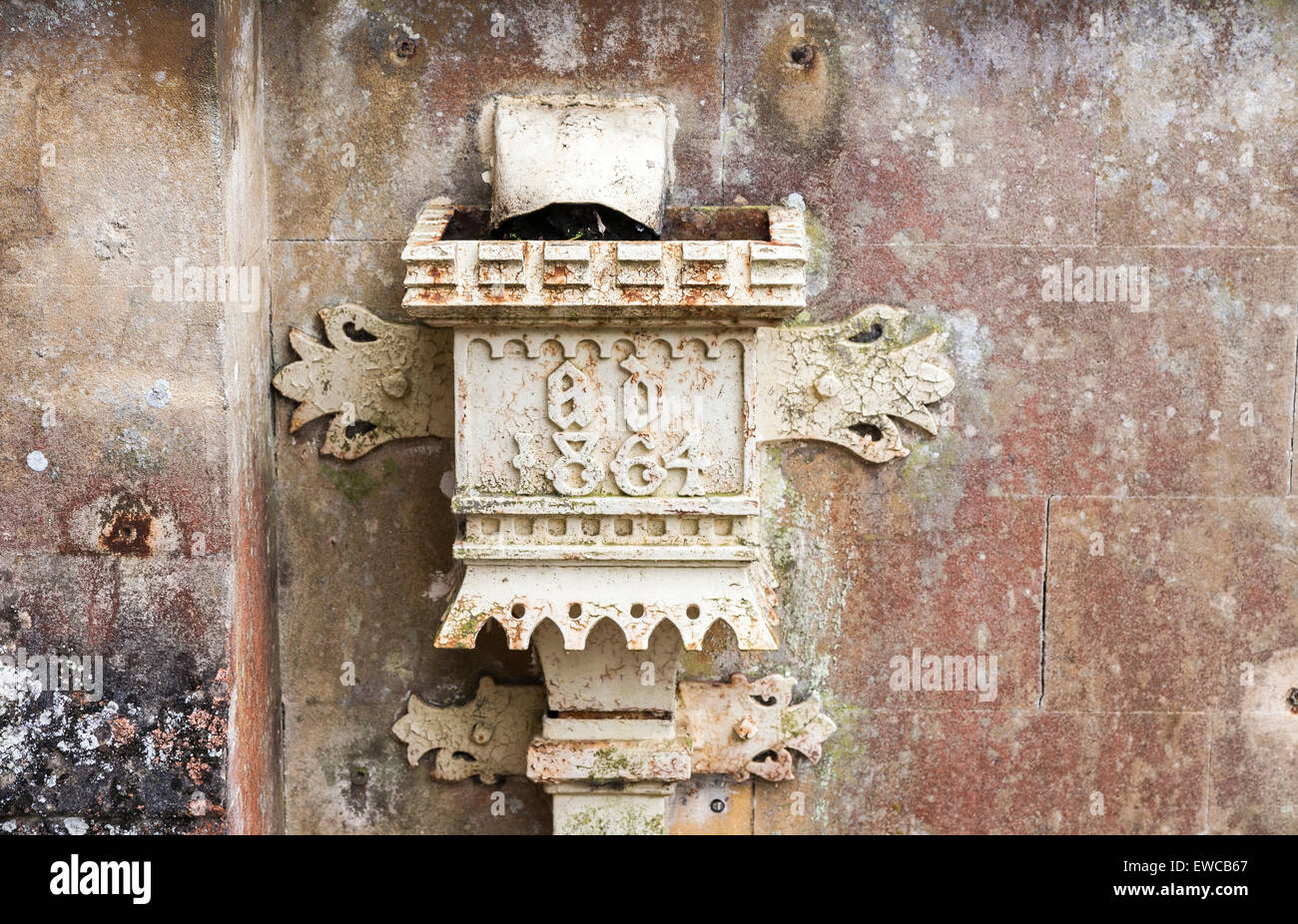 Cast iron hopper dated AD 1864, rusty, peeling paint, Tyntesfield, a ...