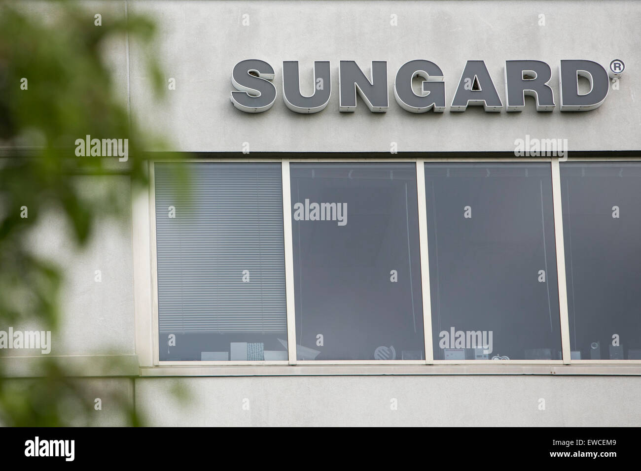 A logo sign outside of the headquarters of SunGard Data Systems in ...