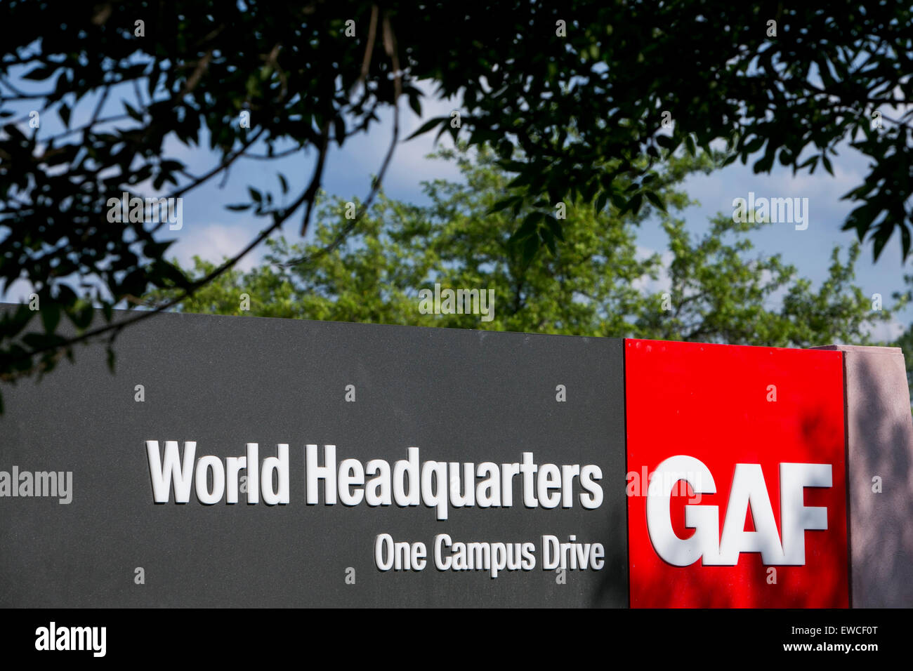 A logo sign outside of the headquarters of GAF Materials Corporation in ...