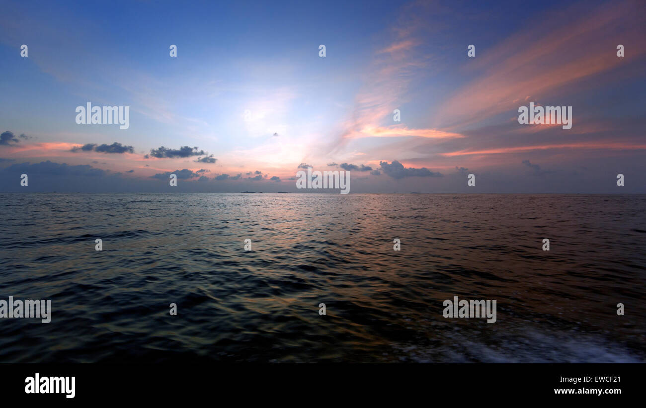 Sunset in the Indian ocean Stock Photo - Alamy
