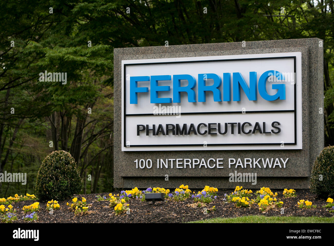 A logo sign outside of the headquarters of Ferring Pharmaceuticals Inc ...