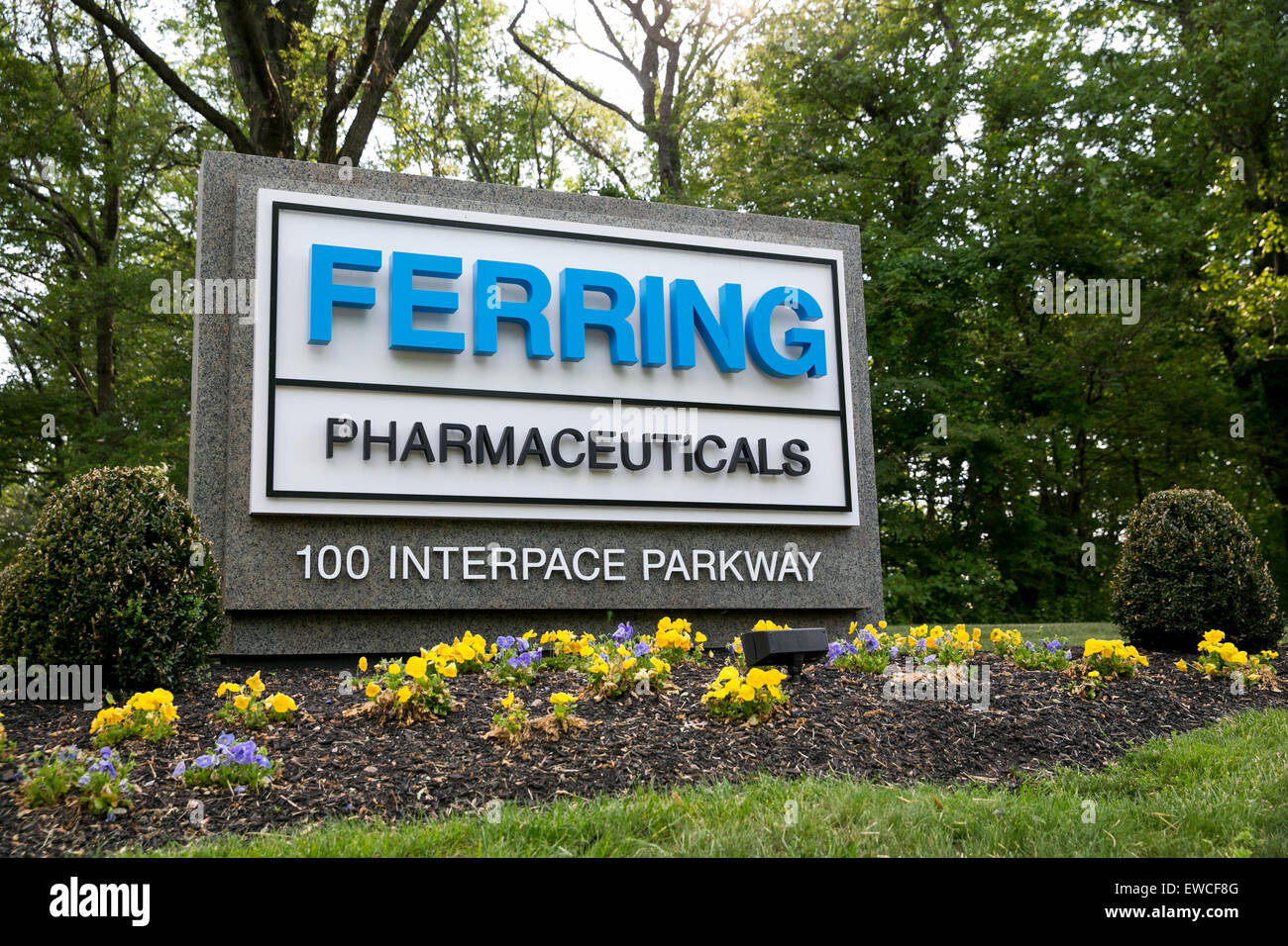 A logo sign outside of the headquarters of Ferring Pharmaceuticals Inc ...