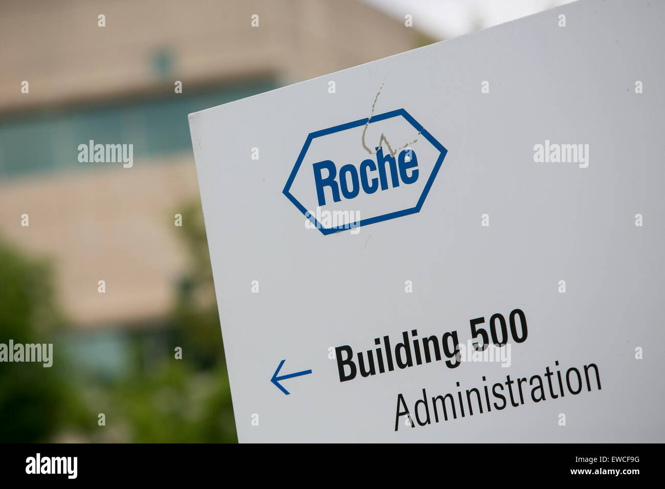 A logo sign outside of facility occupied by Roche Molecular Systems in ...