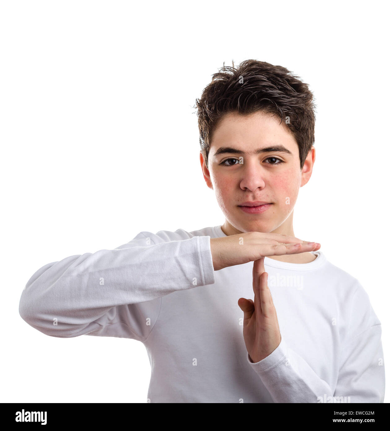 Hispanic boy with acne-prone skin in a white long sleeved t-shirt ...