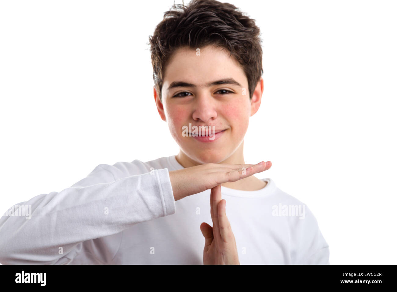 Hispanic boy with acne-prone skin in a white long sleeved t-shirt ...