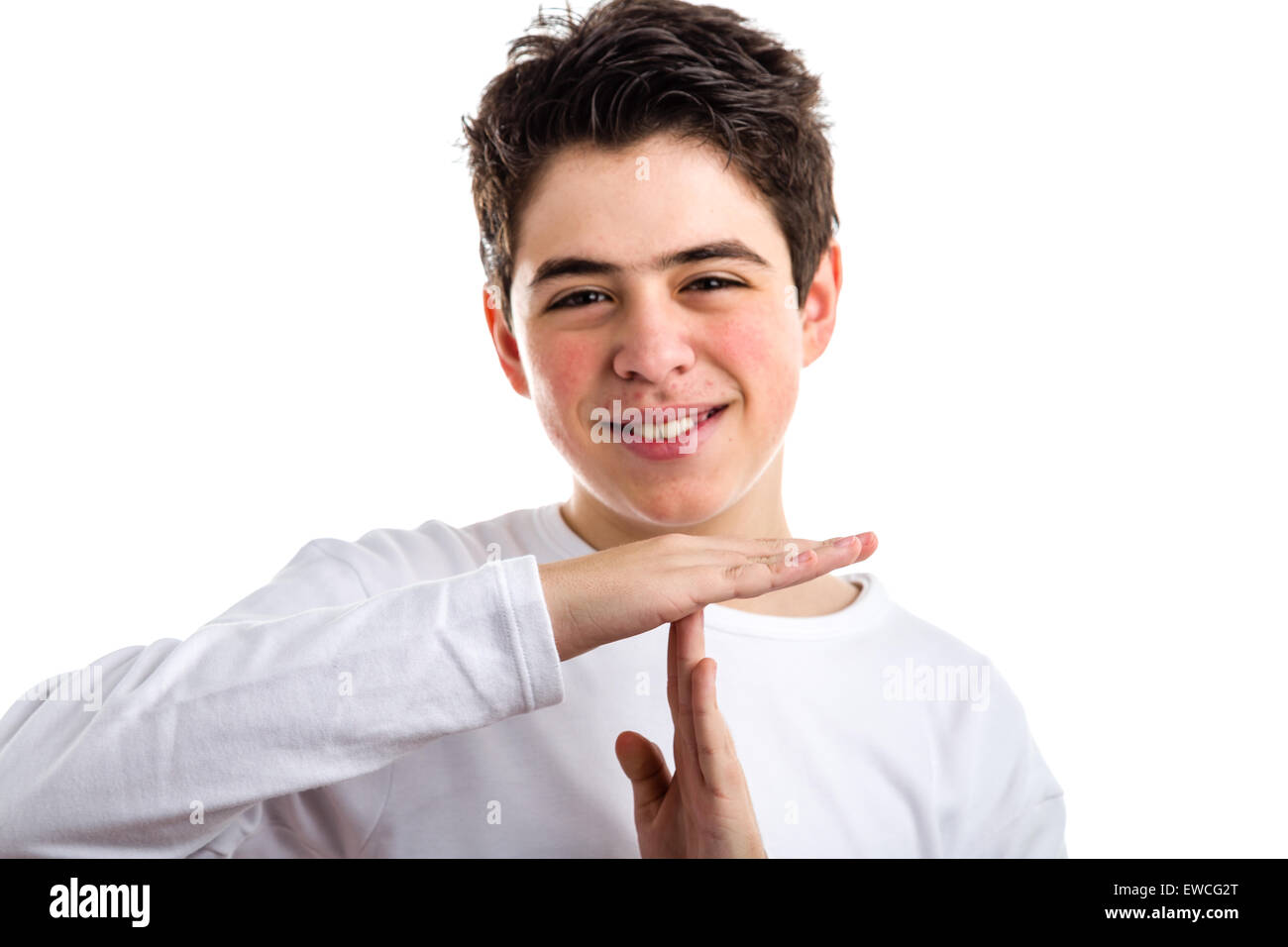 Hispanic boy with acne-prone skin in a white long sleeved t-shirt ...