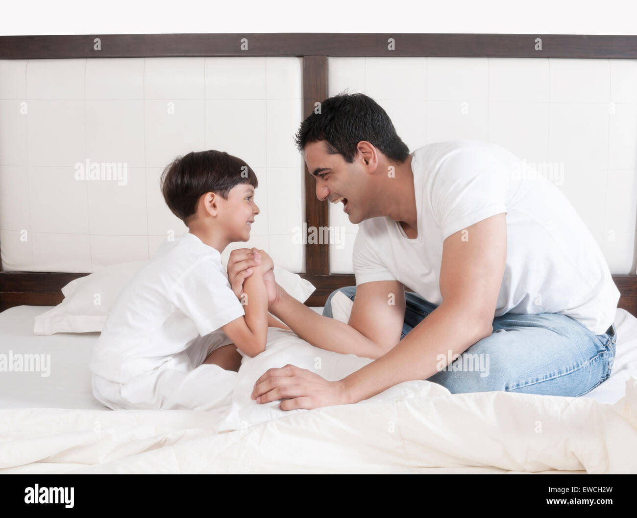 Father son arm wrestling hi-res stock photography and images - Alamy