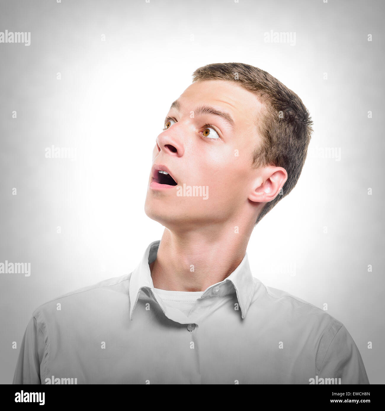 Surprised Young Man Stock Photo - Alamy