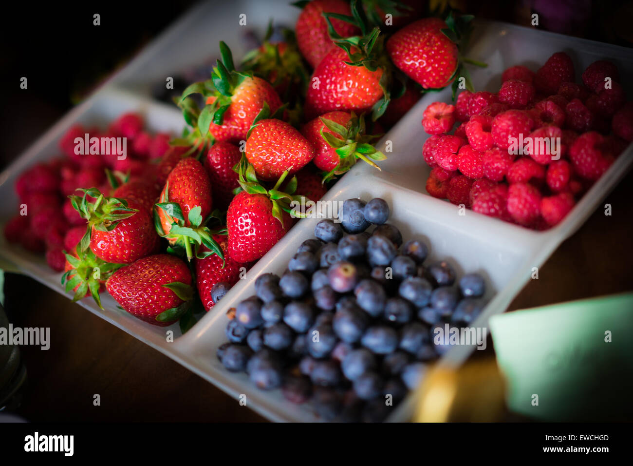 A selection of berries at Easter on a dining table Stock Photo - Alamy