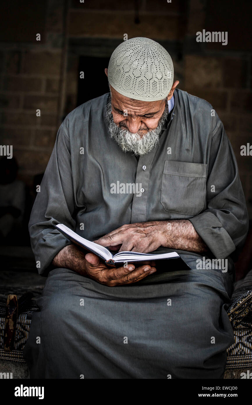 Palestinian man read the Quran in the Omari mosque where many people ...