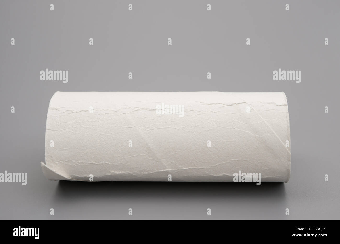 smashed toilet roll on grey Stock Photo - Alamy