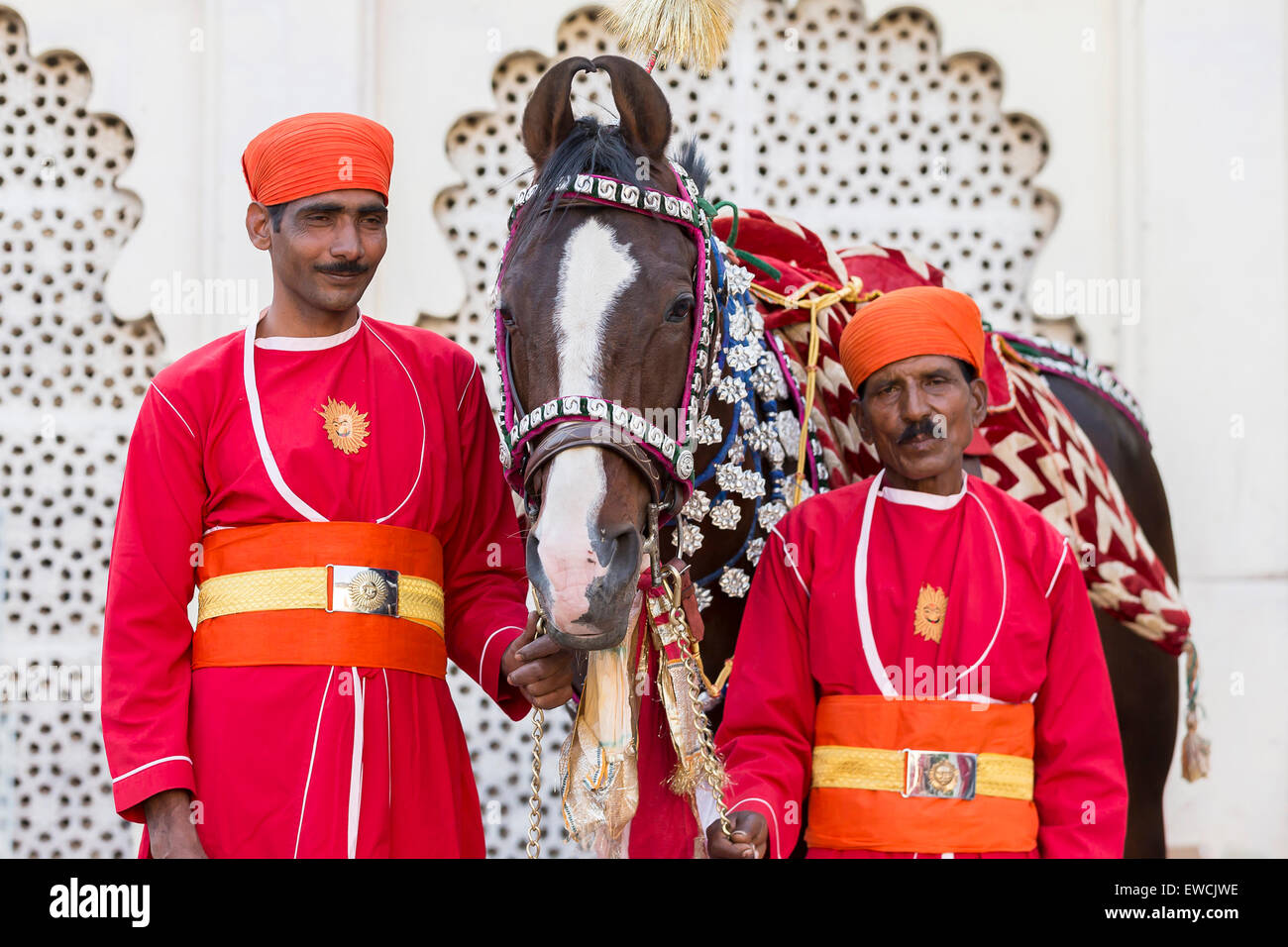 Elaborately decorated Marwari horse with two grooms. Participant in the ...