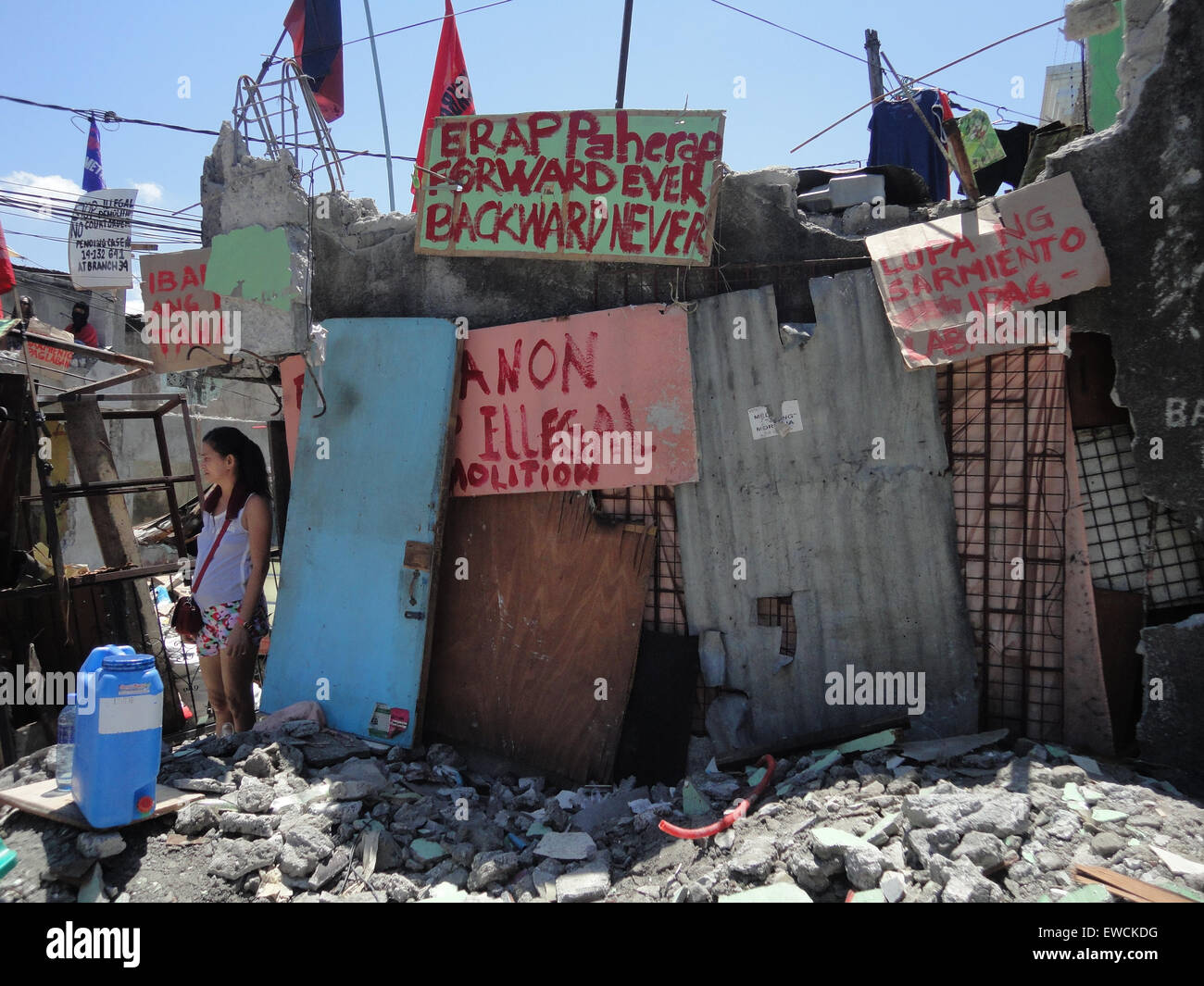 Manila, Philippines. 23rd June, 2015. A resident of Sarmiento Street ...