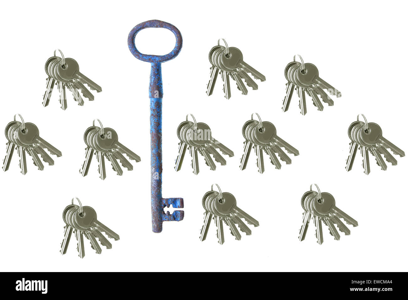 old big vintage forged key standing out from the crowd with small ...