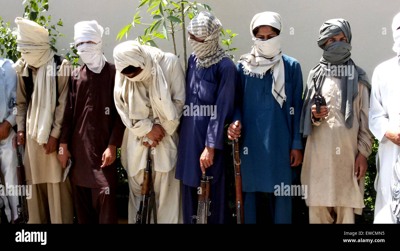 Nangarhar, Afghanistan. 23rd June, 2015. Taliban fighters attend a ...
