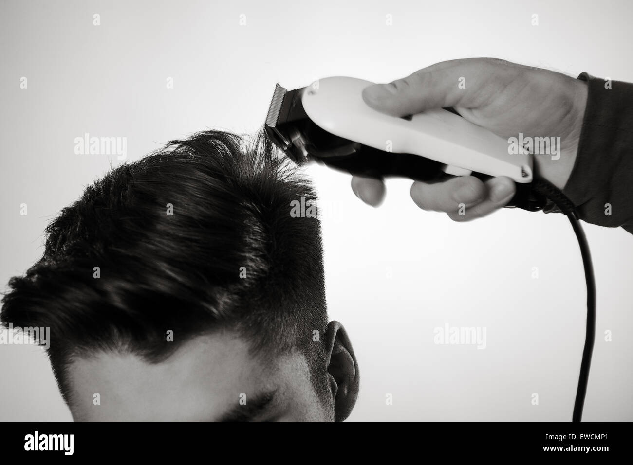 Getting his hair cut hi-res stock photography and images - Alamy