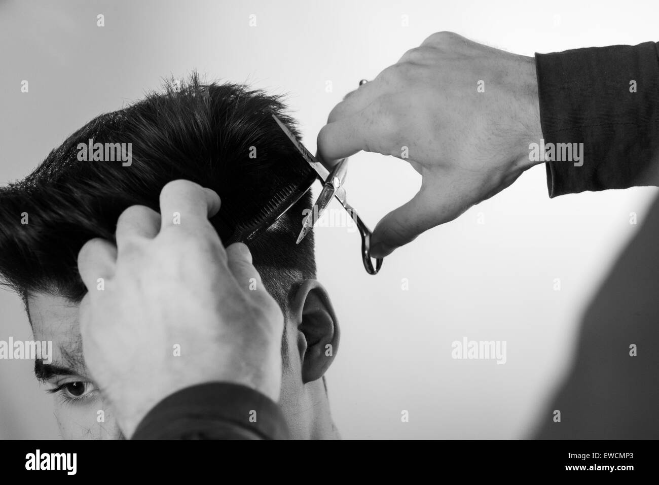 Getting his hair cut hi-res stock photography and images - Alamy