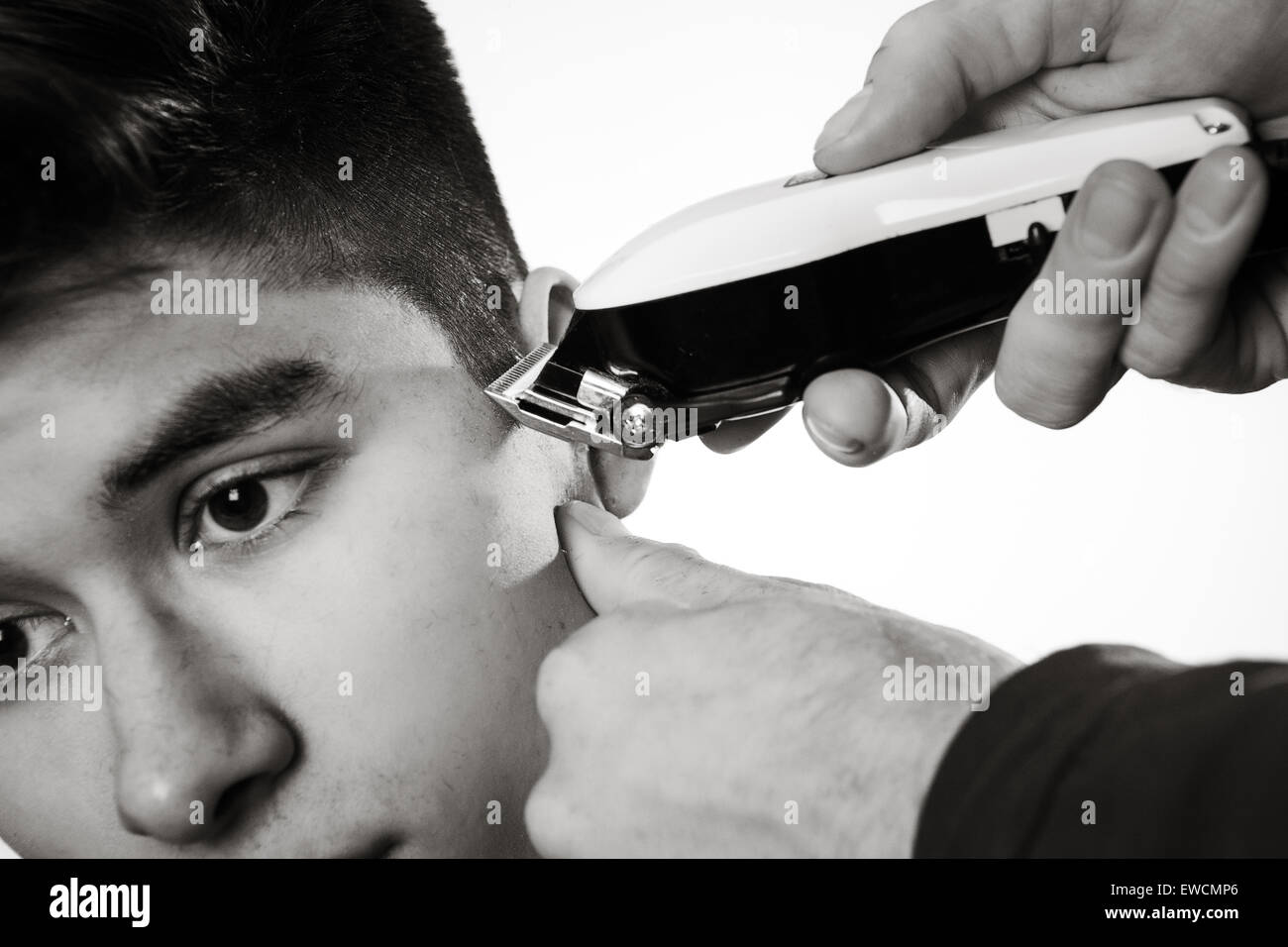 Getting his hair cut hi-res stock photography and images - Alamy