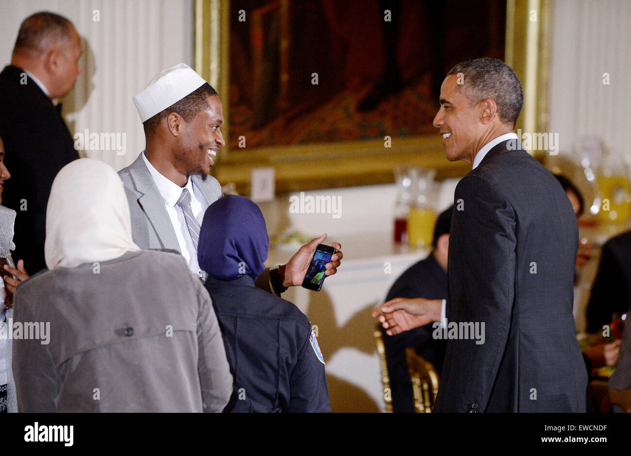 United States President Barack Obama greets guests during an Iftar ...