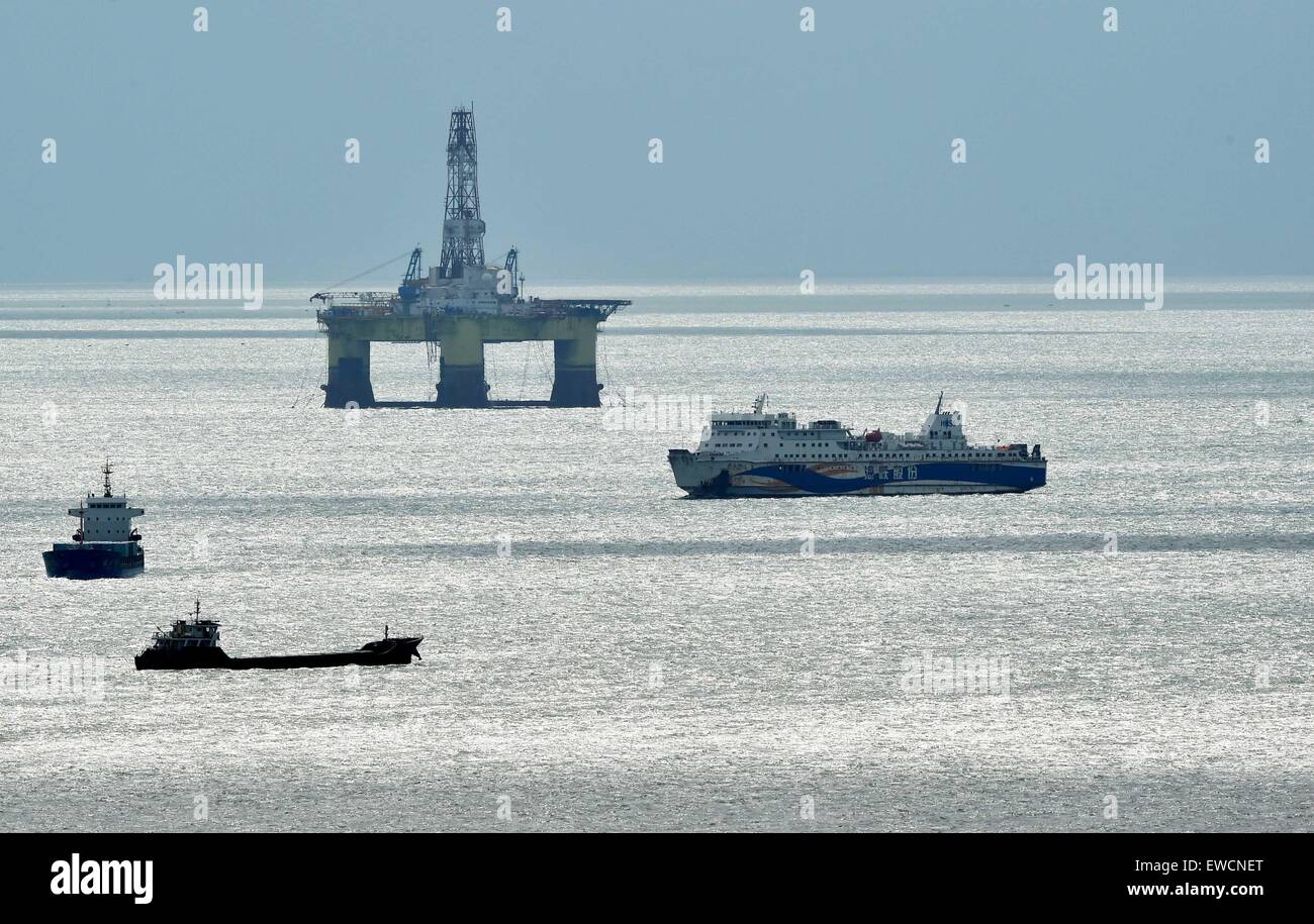 Haikou, China's Hainan Province. 23rd June, 2015. A ship passes through ...