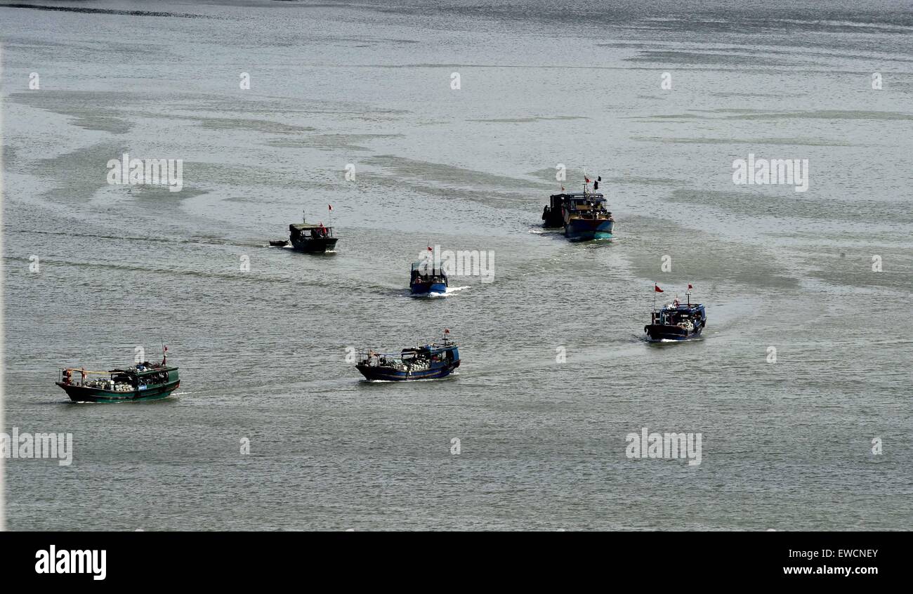 Haikou, China's Hainan Province. 23rd June, 2015. Boats sail towards ...