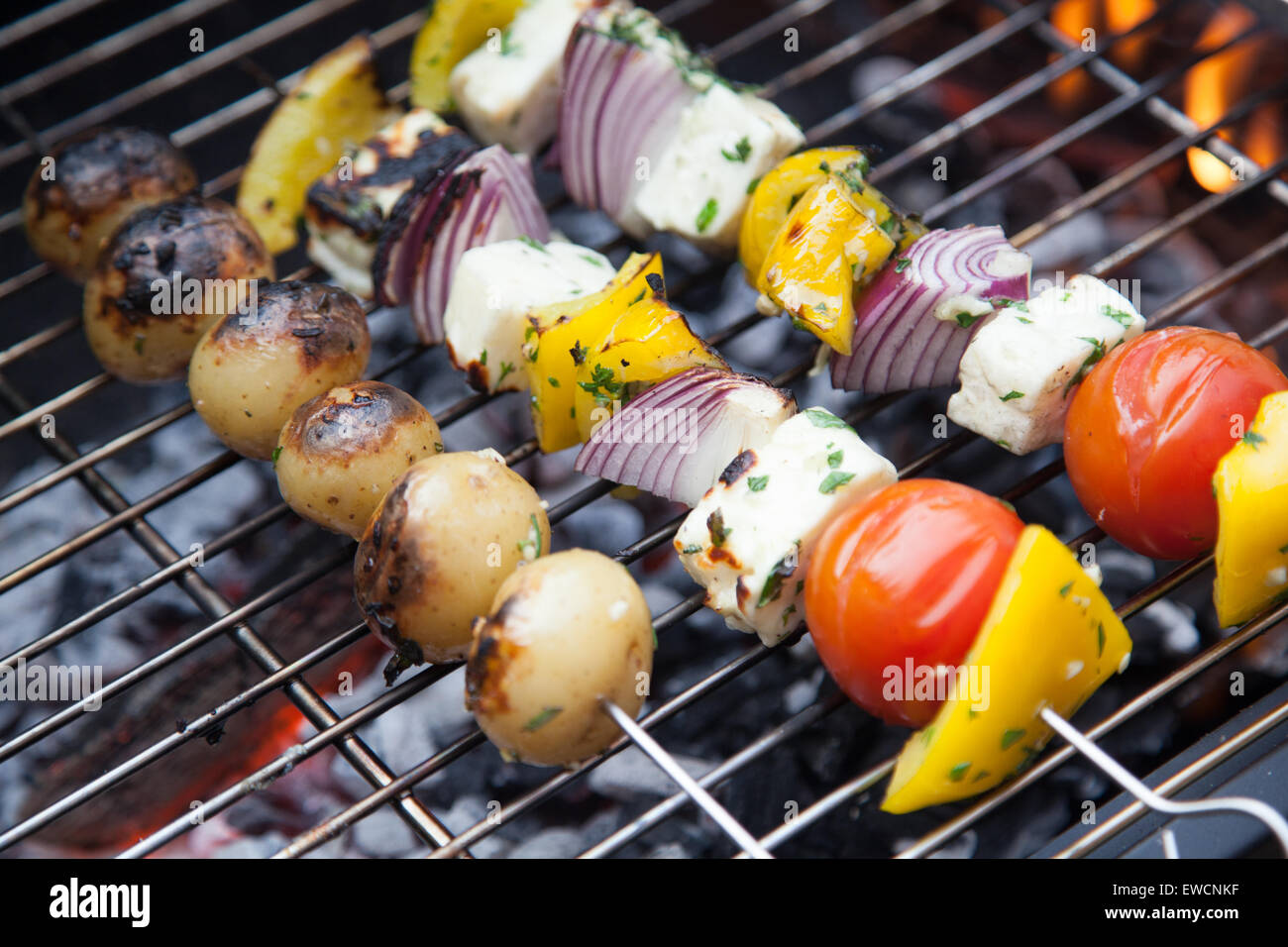Vegetables grilling on a charcoal fire barbeque Stock Photo - Alamy