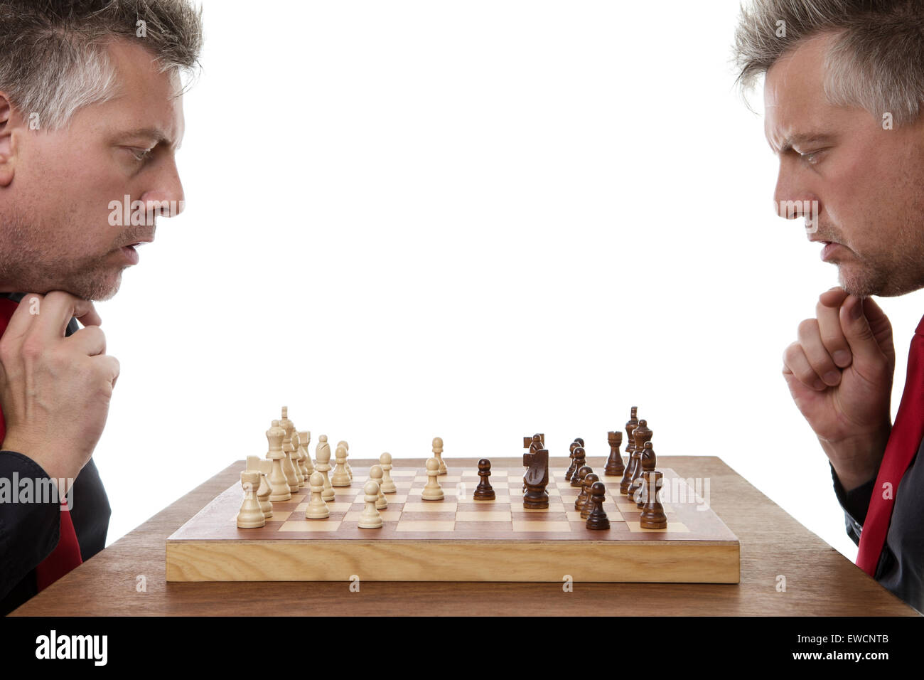 man playing chess against himself shot in the studio Stock Photo - Alamy