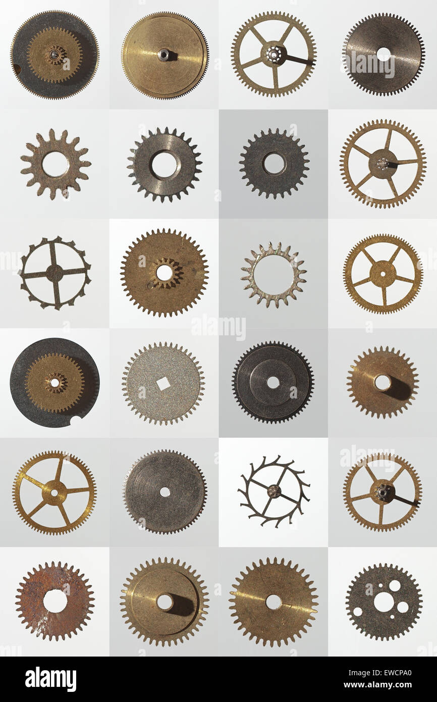 small watch cogs looking down from above background Stock Photo - Alamy