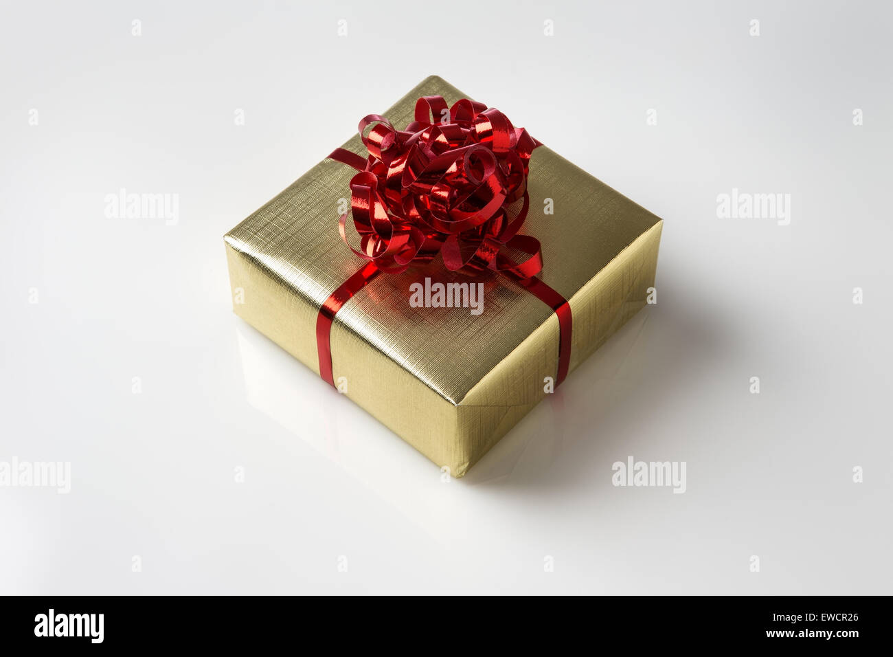 Small gift box with a ribbon around the box Stock Photo - Alamy