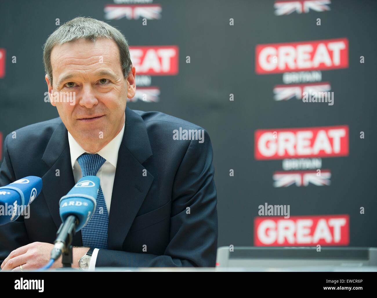 Sir Simon McDonald, British Ambassador to Germany, presents Queen ...