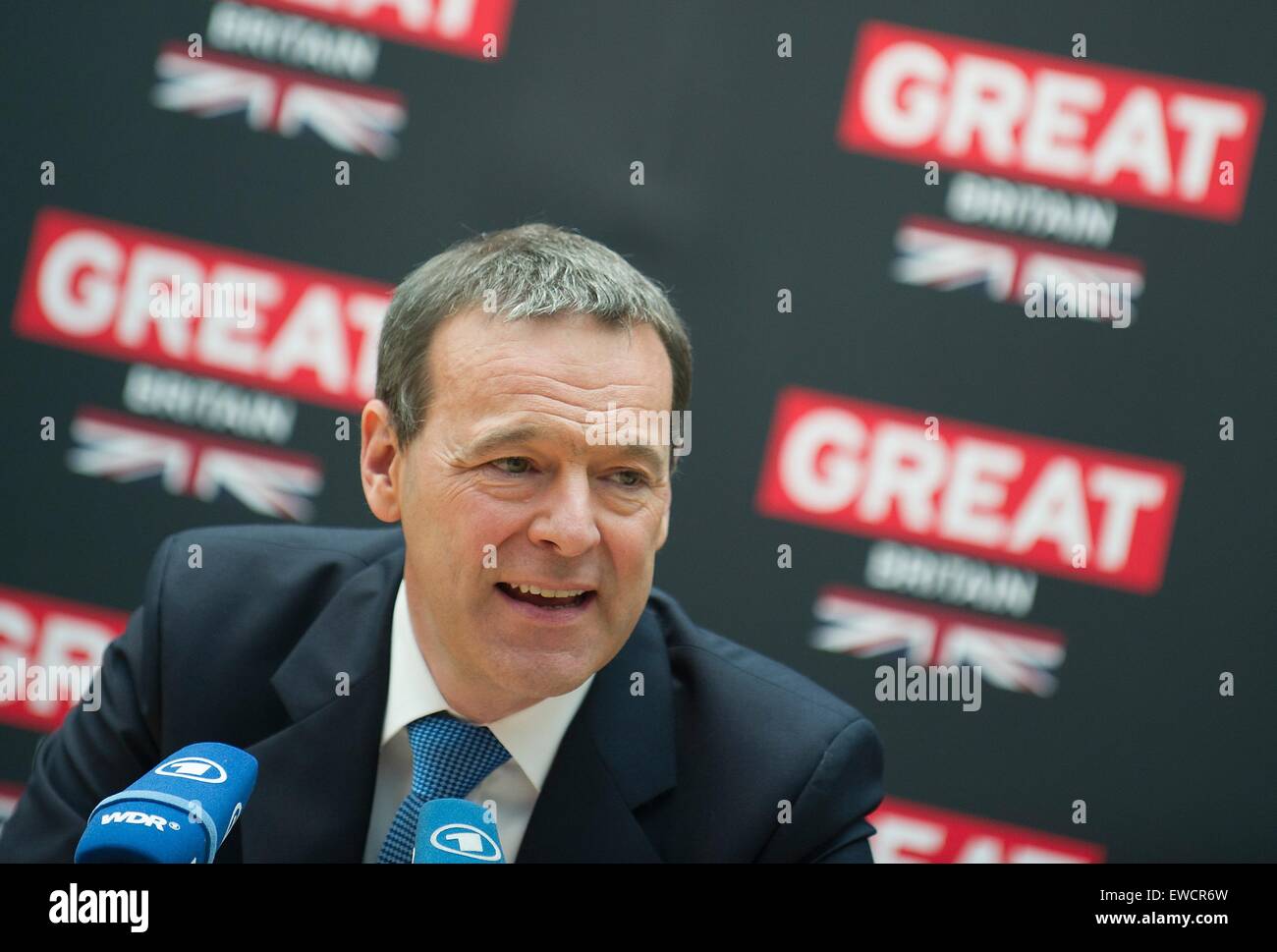 Sir Simon McDonald, British Ambassador to Germany, presents Queen ...