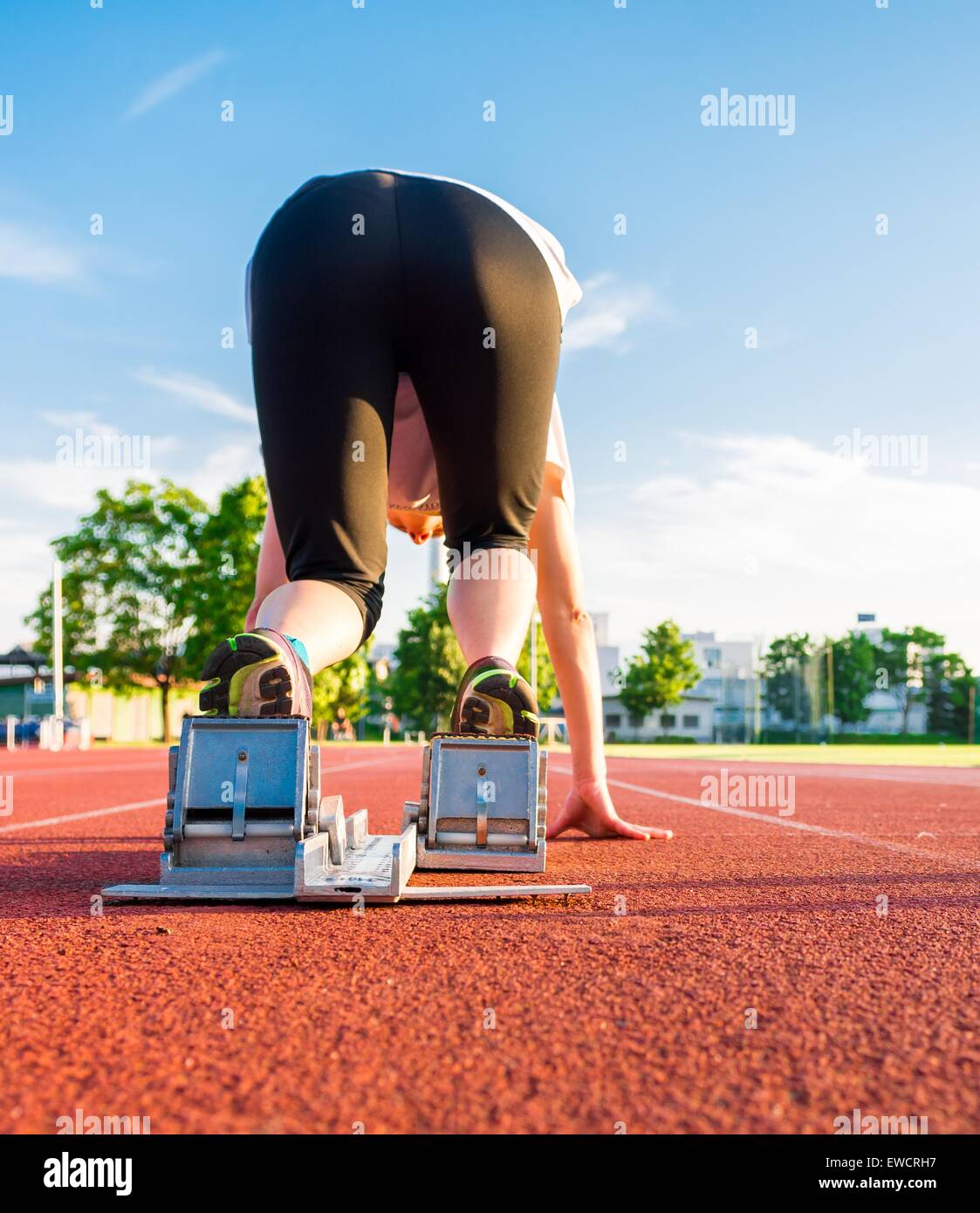 Sprinter getting ready to start Stock Photo - Alamy