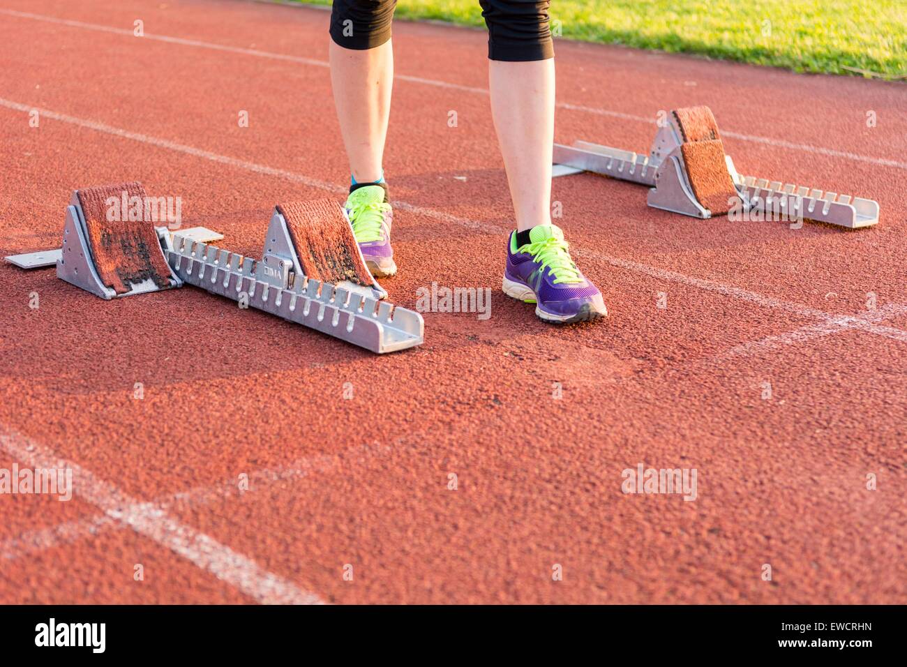 Female Sprinter Starting Block Stock Photos & Female Sprinter Starting ...