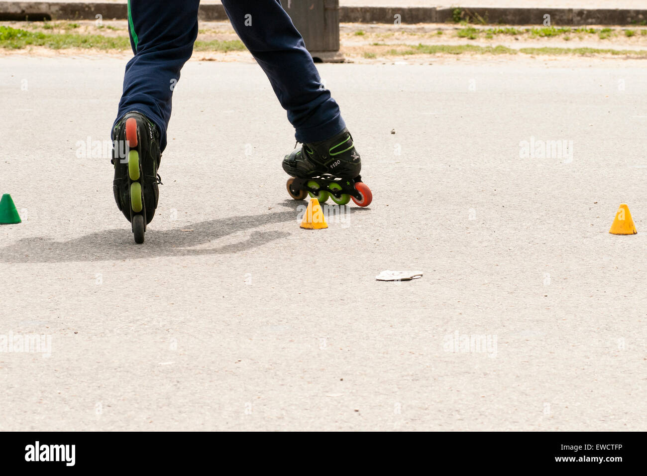 slalom with Inline skates Stock Photo - Alamy
