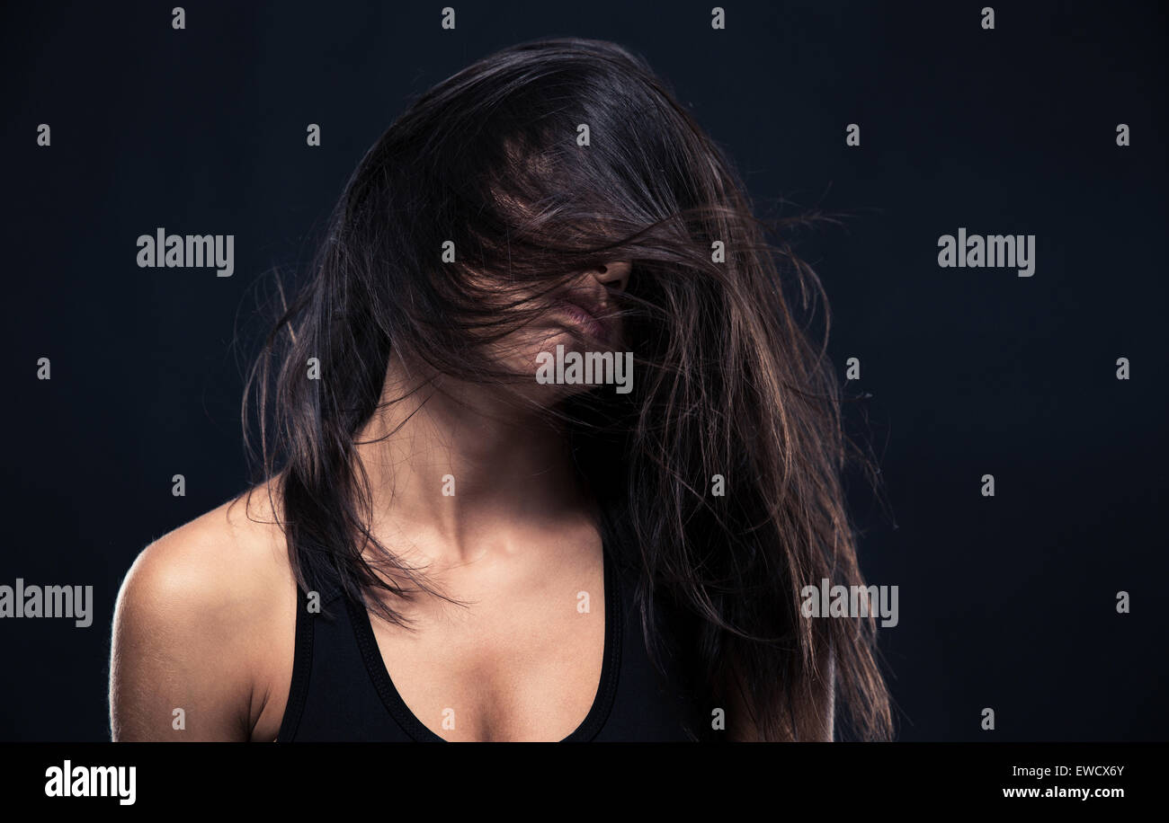 Portrait of exhausted woman over black background Stock Photo - Alamy